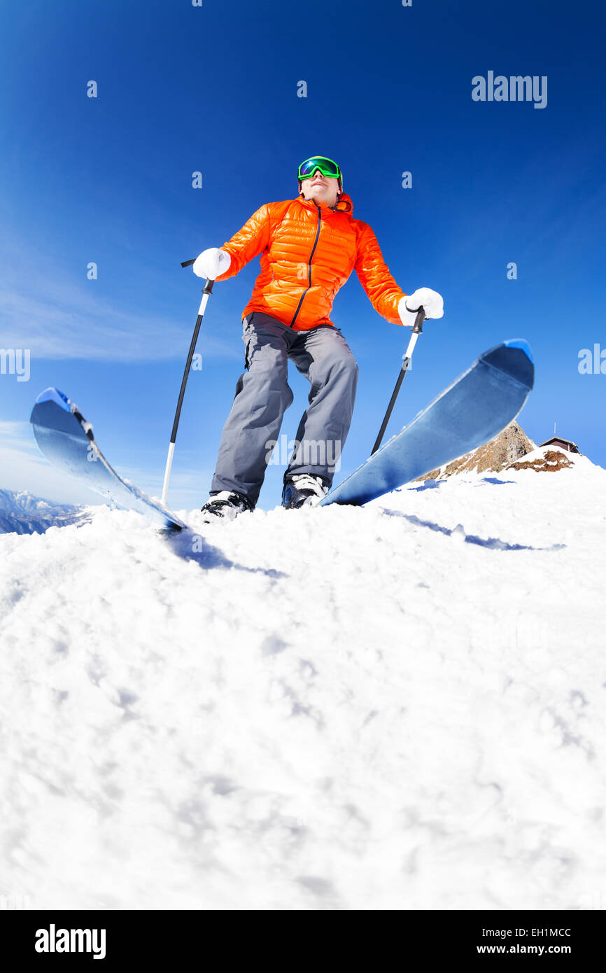 Active young man ready to skiing view from below Stock Photo - Alamy