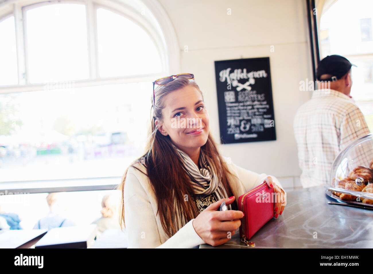 Female Checkout Counter High Resolution Stock Photography and Images ...