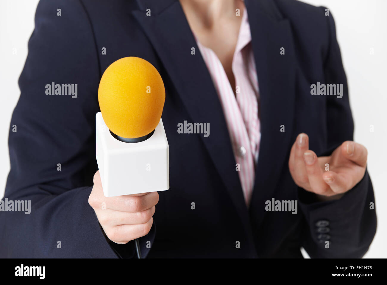 Woman with microphone interview hi-res stock photography and images - Alamy