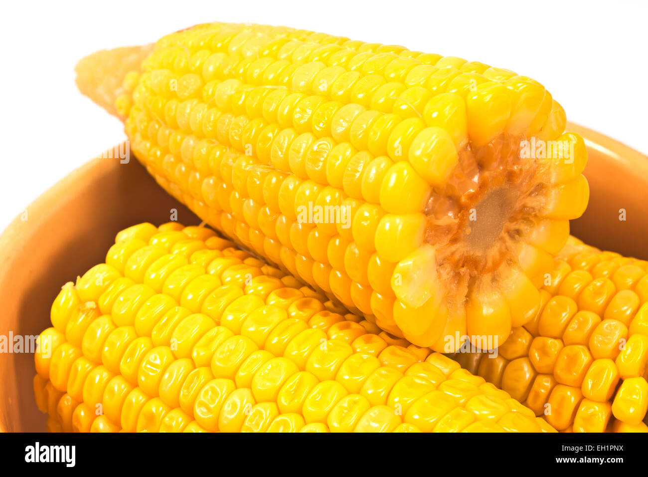 Close up of boiled corn in ceramic bowl on white Stock Photo - Alamy