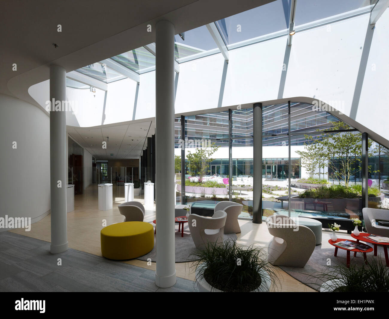 Lobby and circulation space with access to courtyard garden. Astellas ...