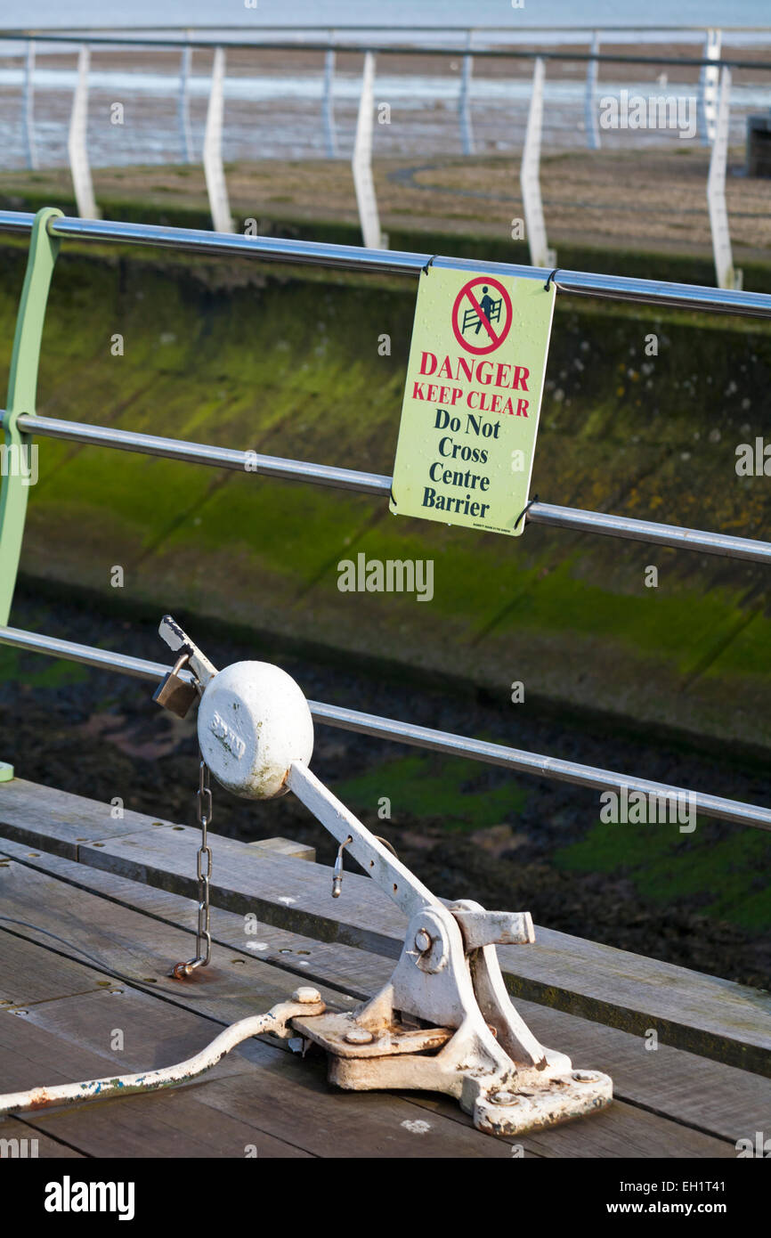 track equipment on railway station on station pier with danger keep ...