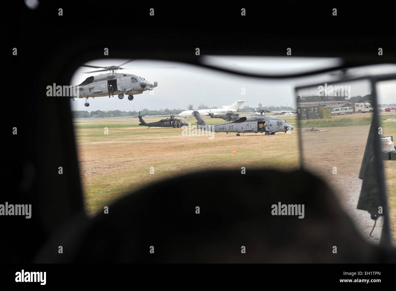 US military helicopters land at Port Au Prince airport for earthquake ...
