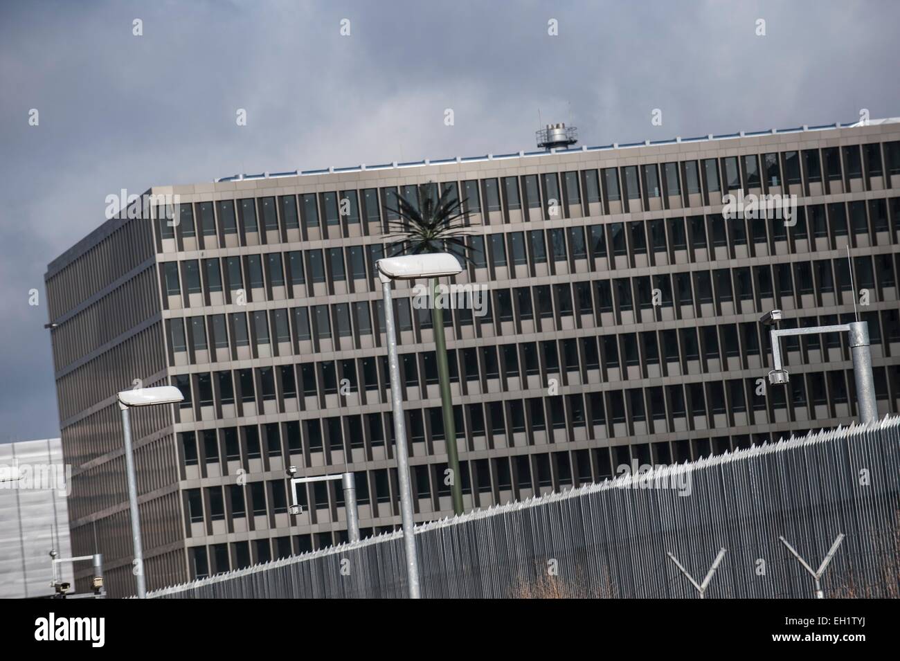 Surveillance cameras and fences are securing the new headquarters of ...