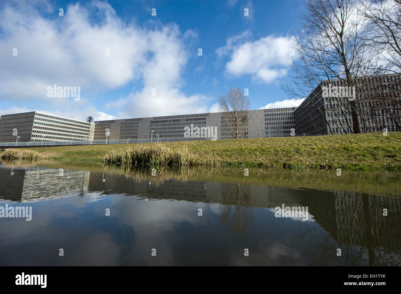 A small body of water is reflecting the new headquarters of the German ...