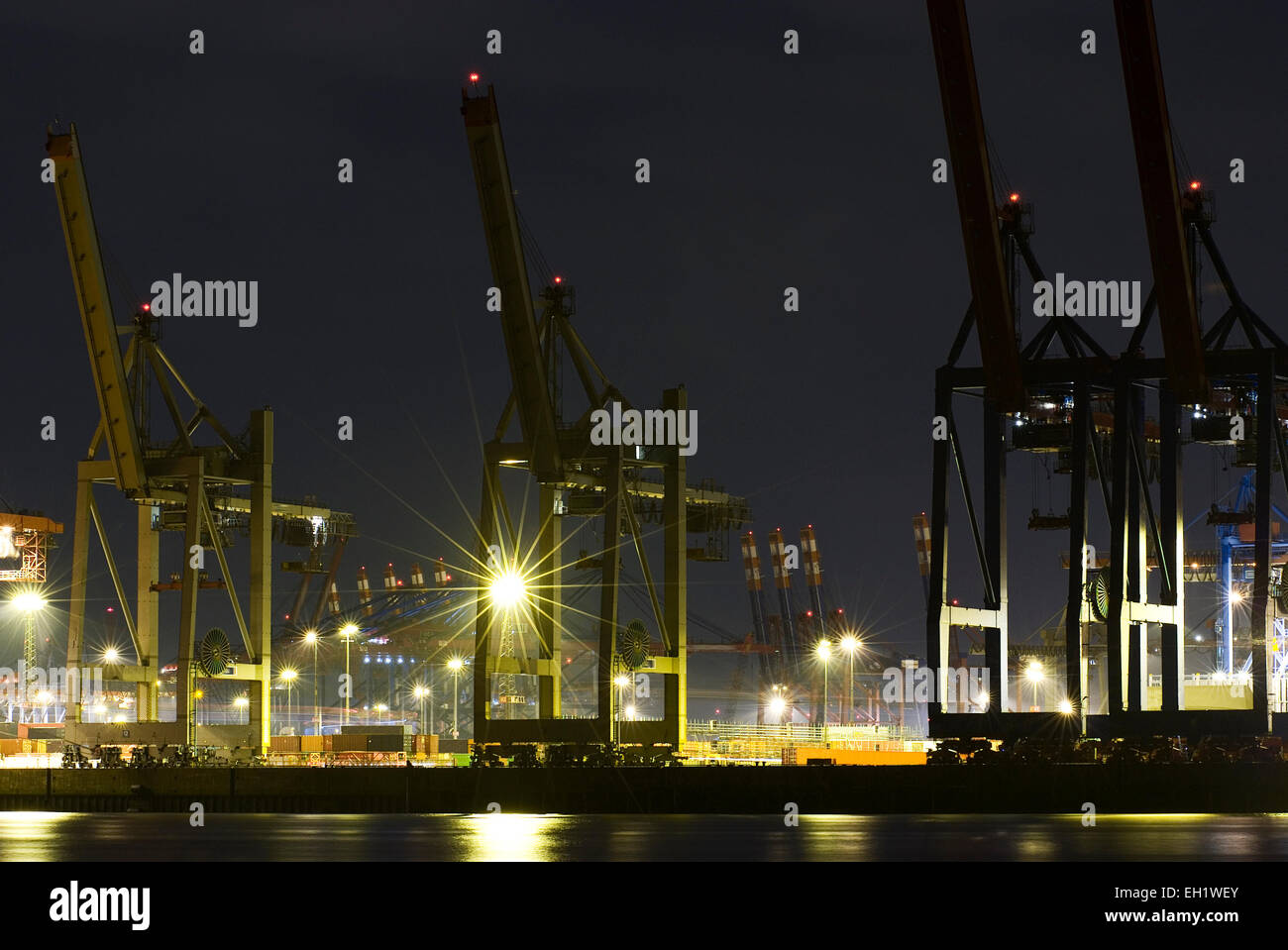 Commercial port at night Stock Photo - Alamy