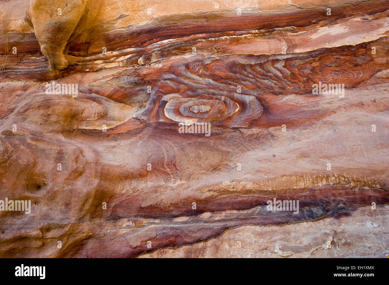Rocks with colored layers in Petra in Jordan Stock Photo - Alamy