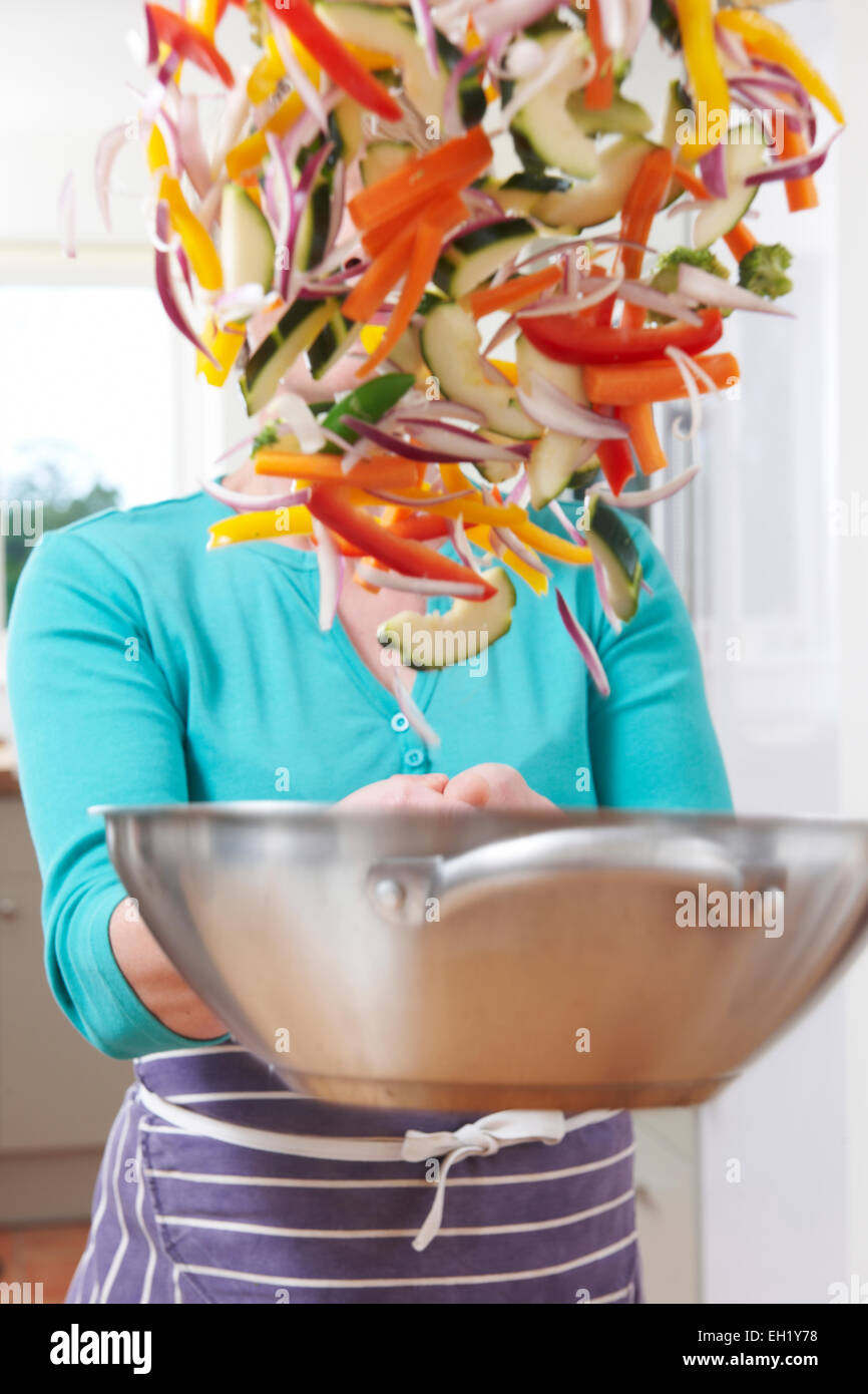 Person frying vegetables cooking hi-res stock photography and images ...