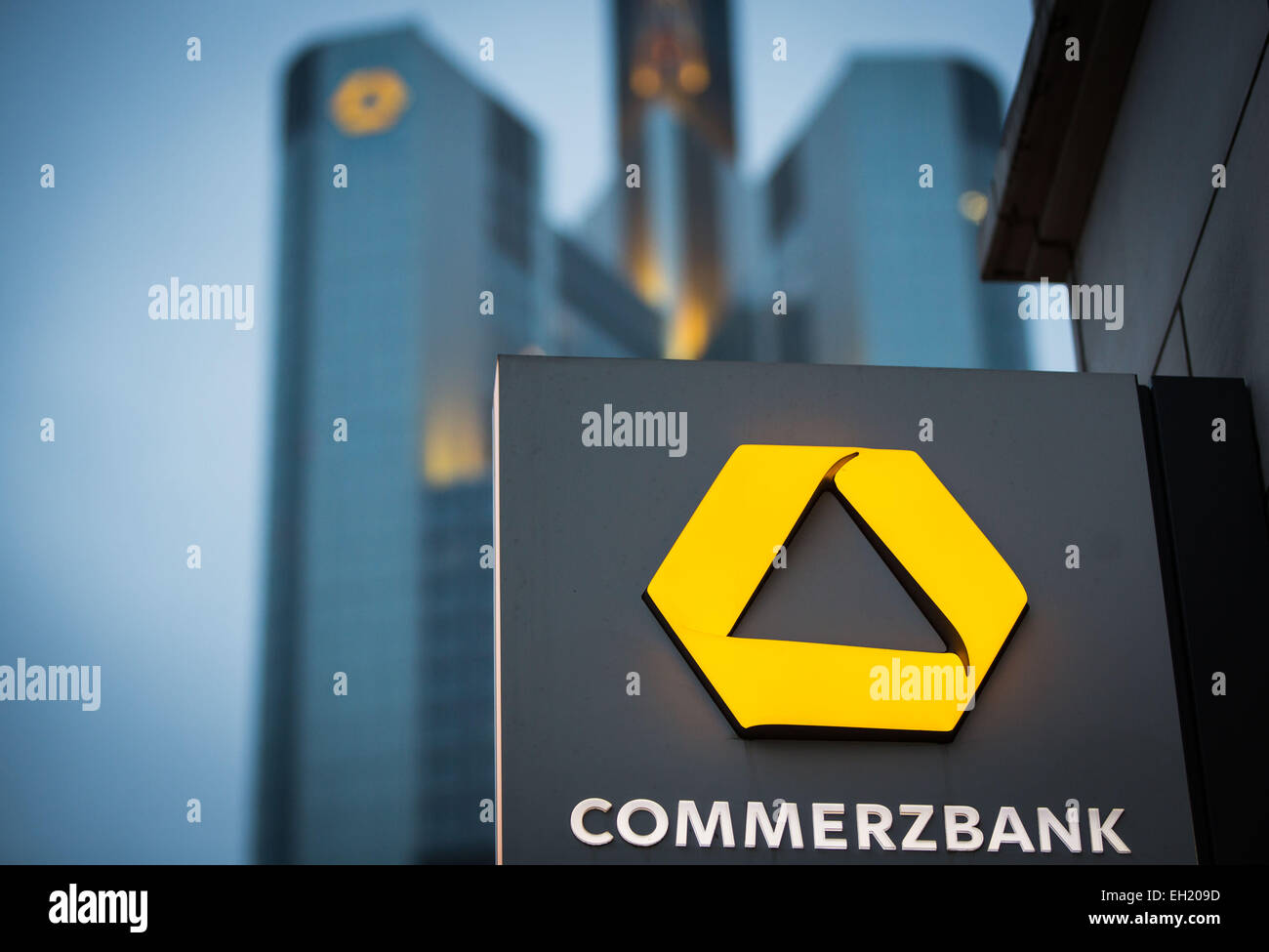 The logo of Commerzbank shines bright in front of the headquarter ...