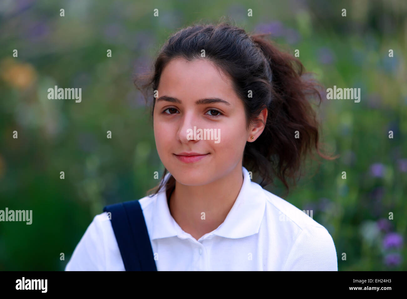 Beautiful student girl in the park Stock Photo - Alamy