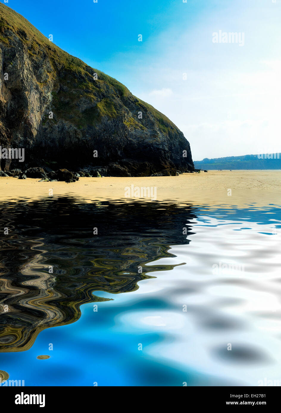 Cliff beach and sky reflected into a digitally created pool of water ...
