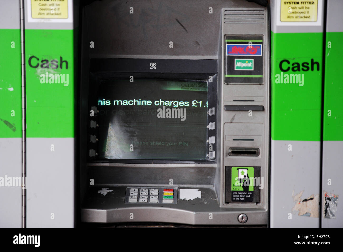 Tatty looking ATM cash machine that charges to make withdrawals ...