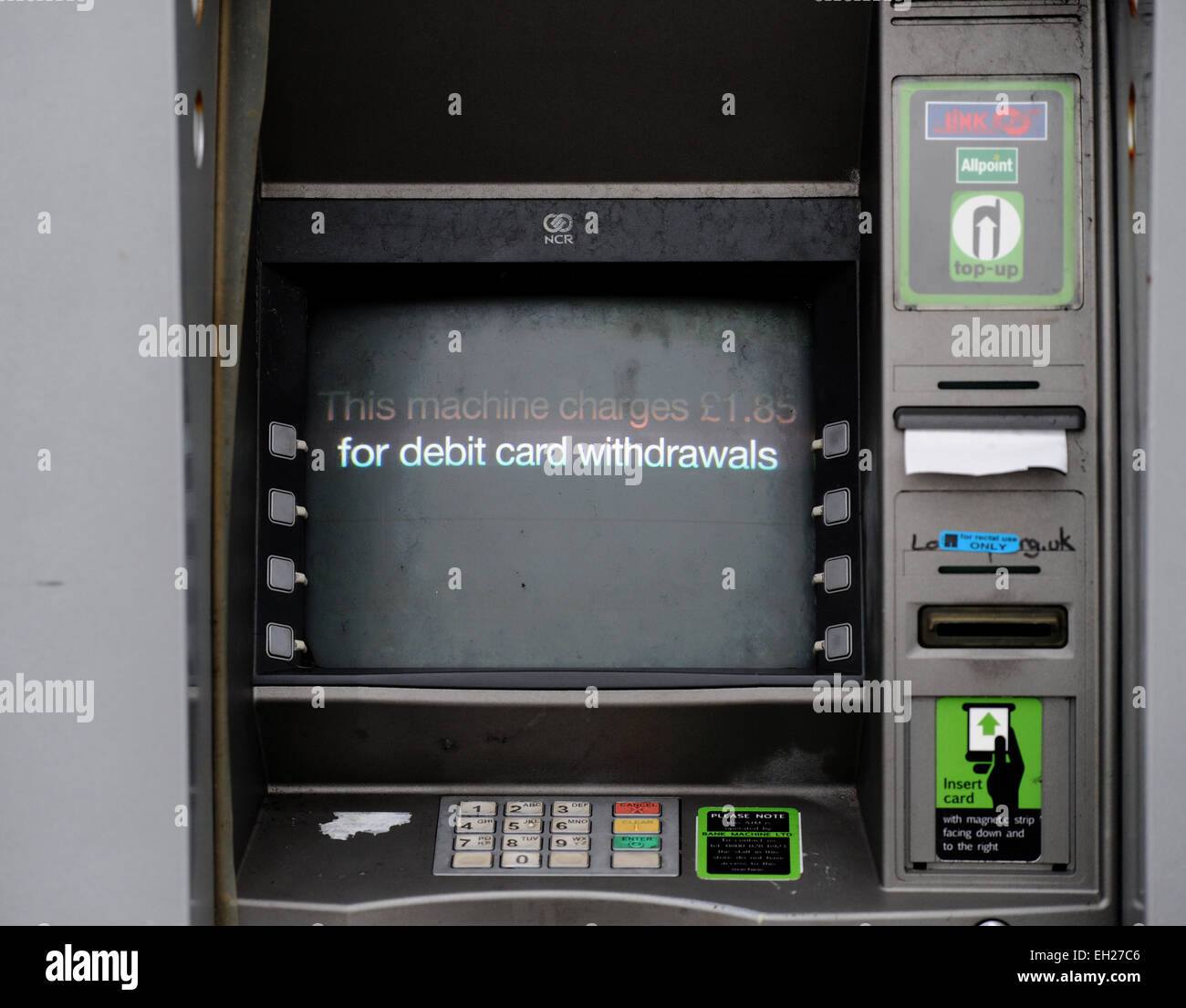Tatty looking ATM cash machine that charges to make withdrawals ...