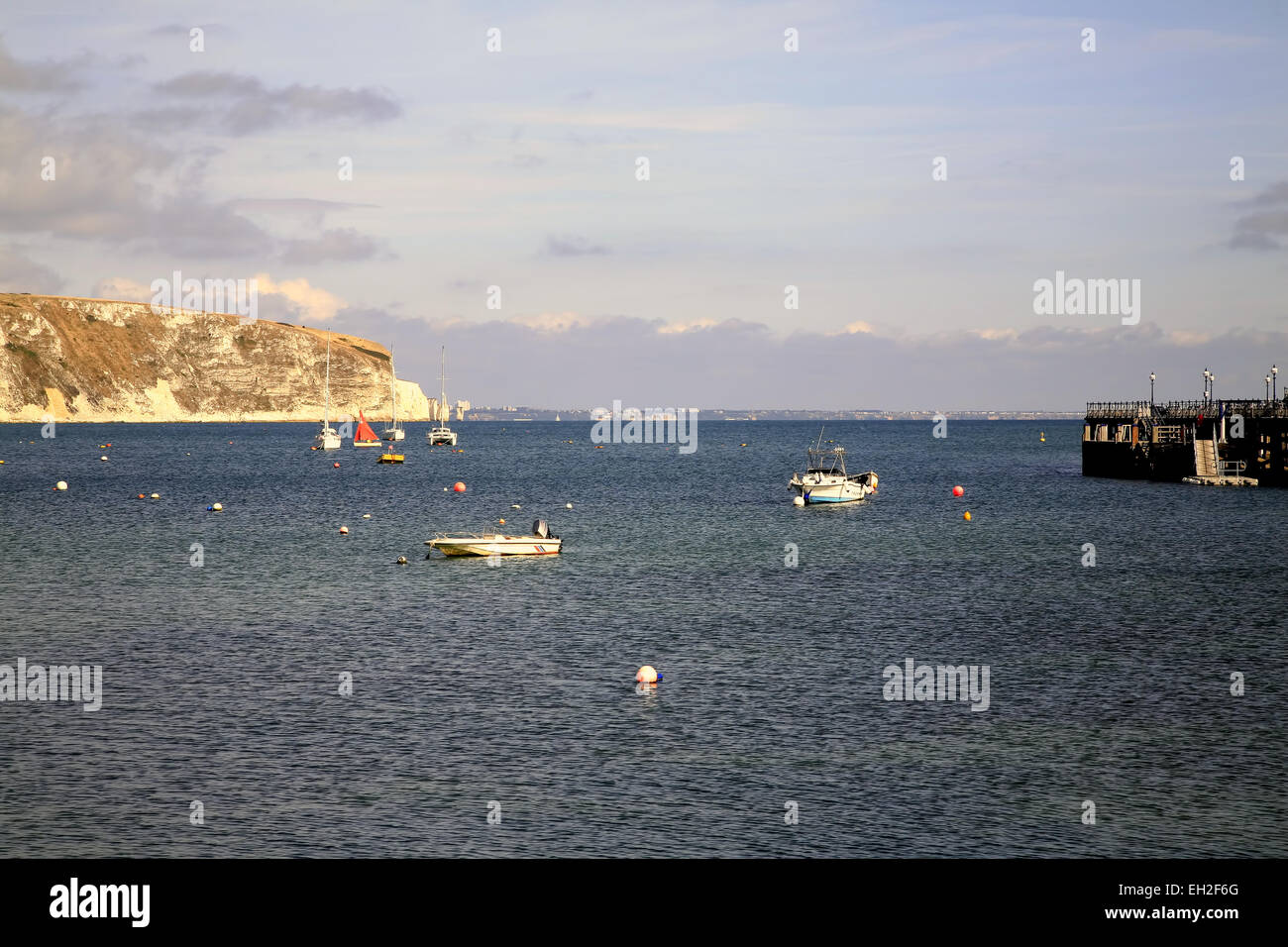 A view of the bay with Ballard point and the pier at Swanage bay ...