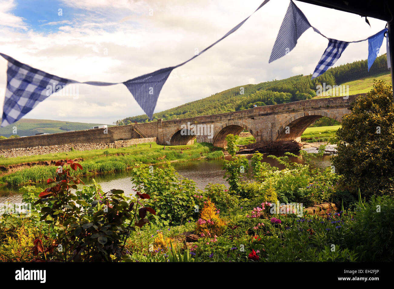 Country Bunting at a Yorkshire Dales Beauty spot, Burnsall Bridge ...