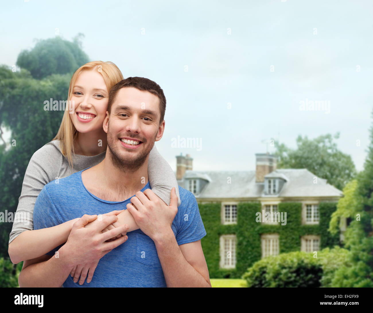 smiling couple hugging Stock Photo - Alamy