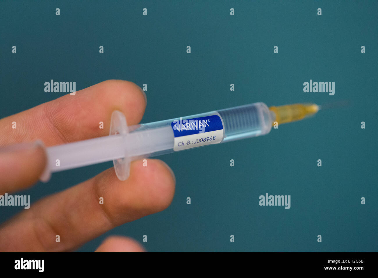 ILLUSTRATION - ILLUSTRATION - a syringe filled with water with a ...