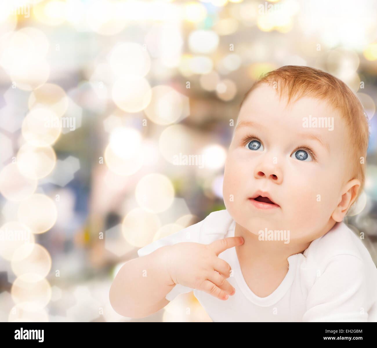 curious baby looking up Stock Photo - Alamy