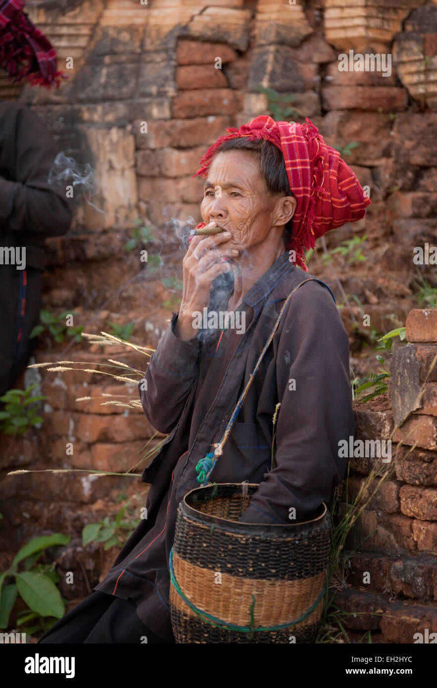 A burmese woman smoking a cigar, Inle lake, Myanmar ( Burma ), Asia ...
