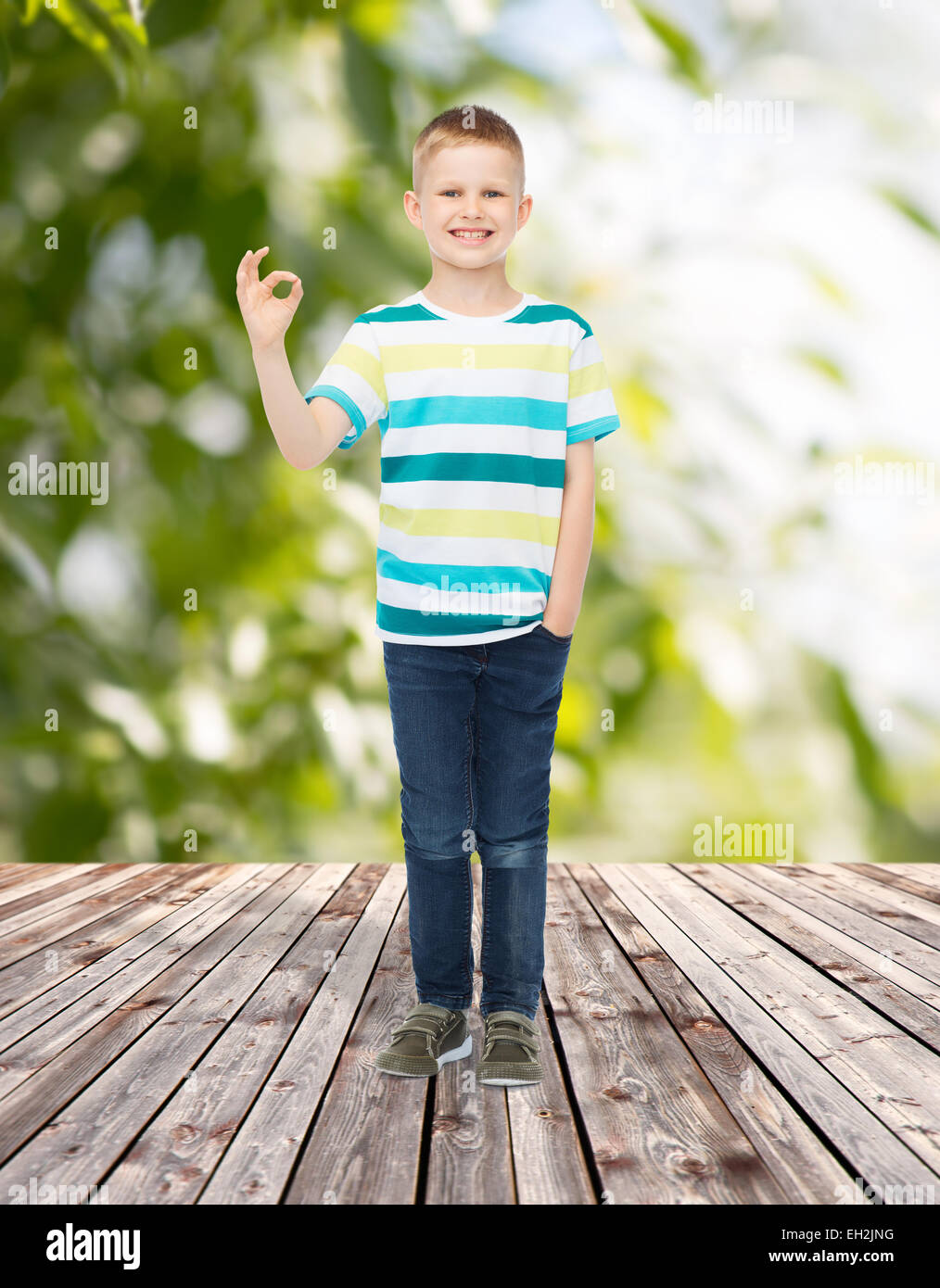 smiling little boy showing ok sign Stock Photo - Alamy