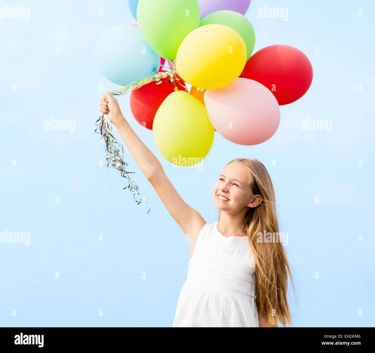 happy girl with colorful balloons Stock Photo - Alamy