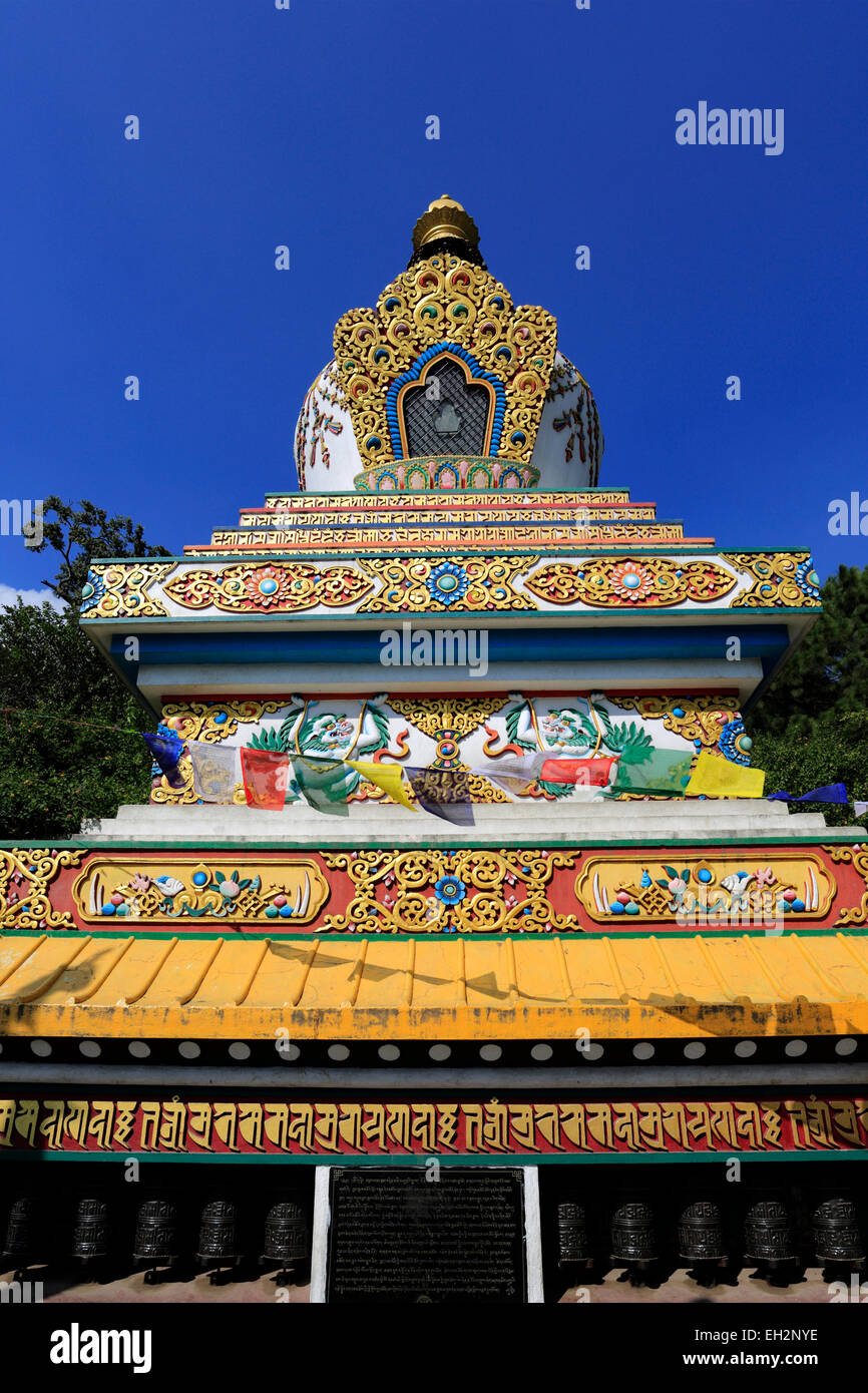 Part of the 245 foot long prayer wheel wall and Buddhist Stupas built ...