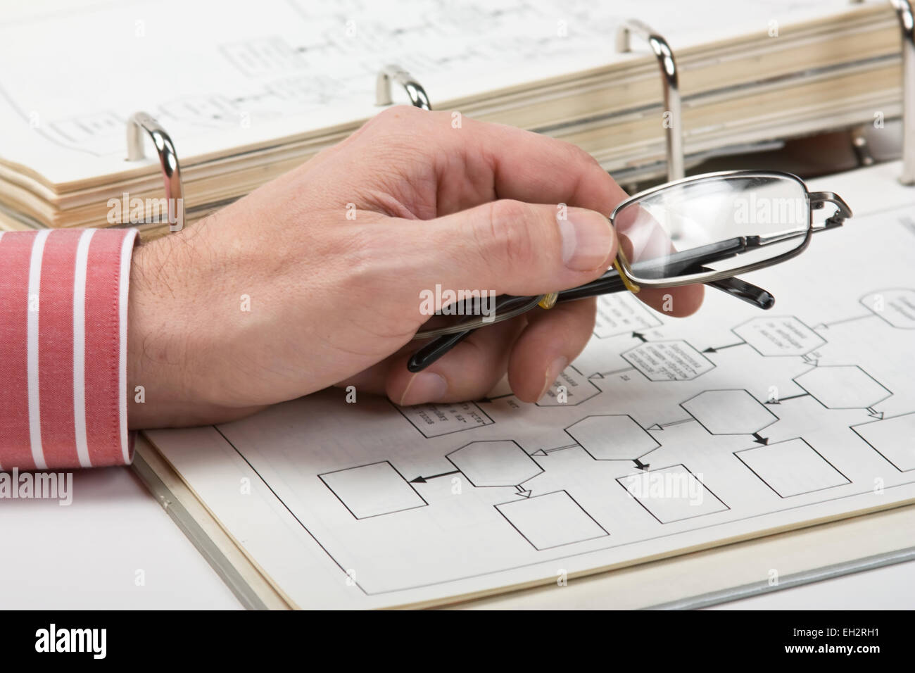 hands holds glasses and folder isolated on white background Stock Photo ...