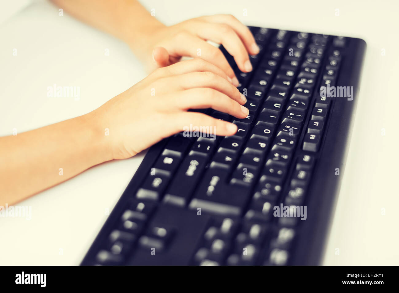 student girls hands typing on keyboard Stock Photo - Alamy