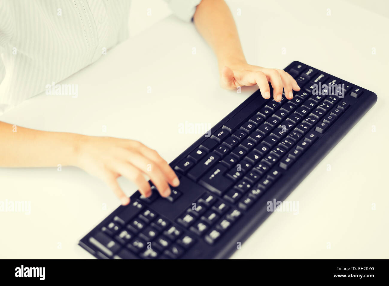 student girls hands typing on keyboard Stock Photo - Alamy