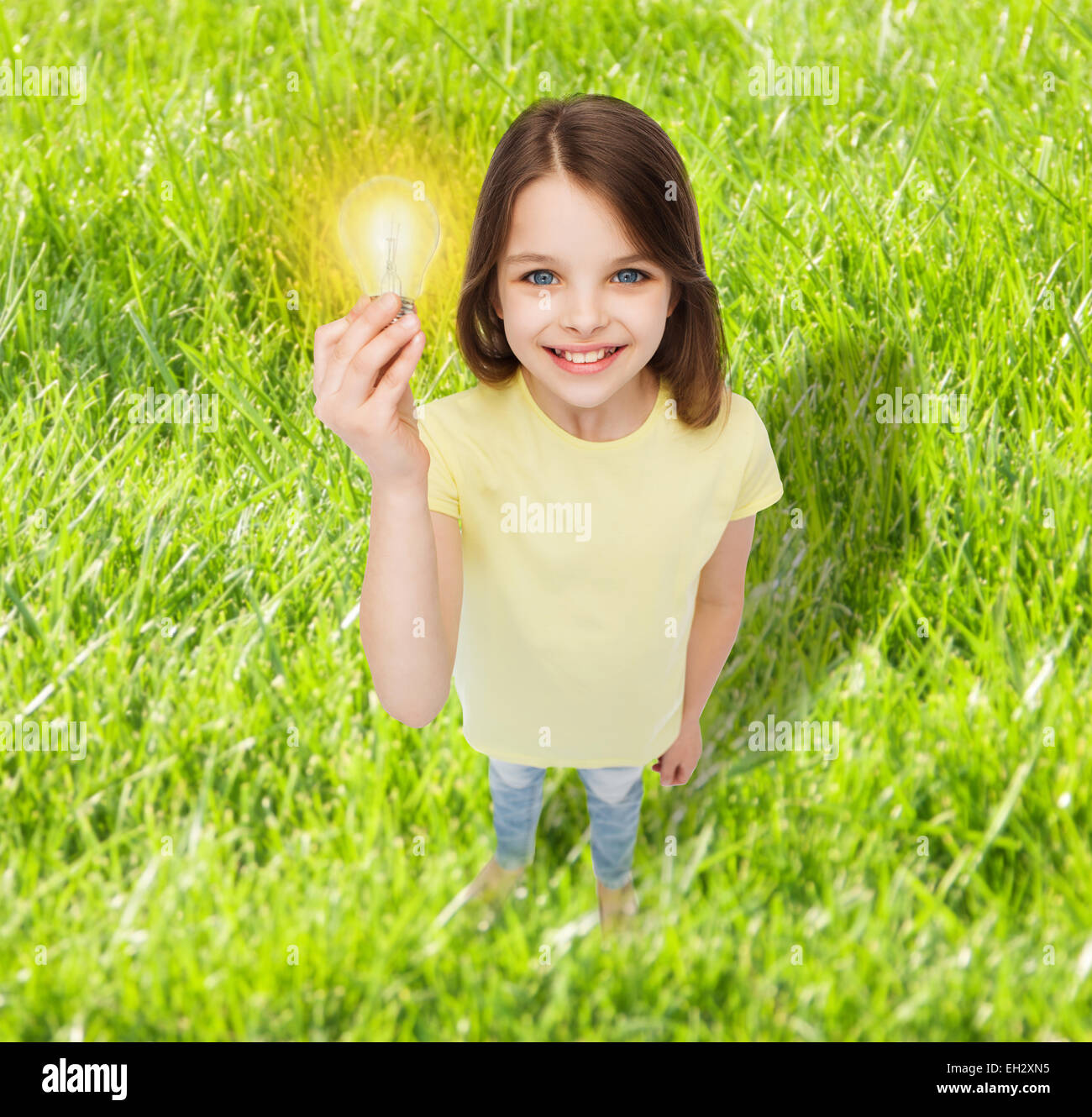 smiling little girl holding light bulb Stock Photo - Alamy smiling little girl holding light bulb Stock Photo - Alamy