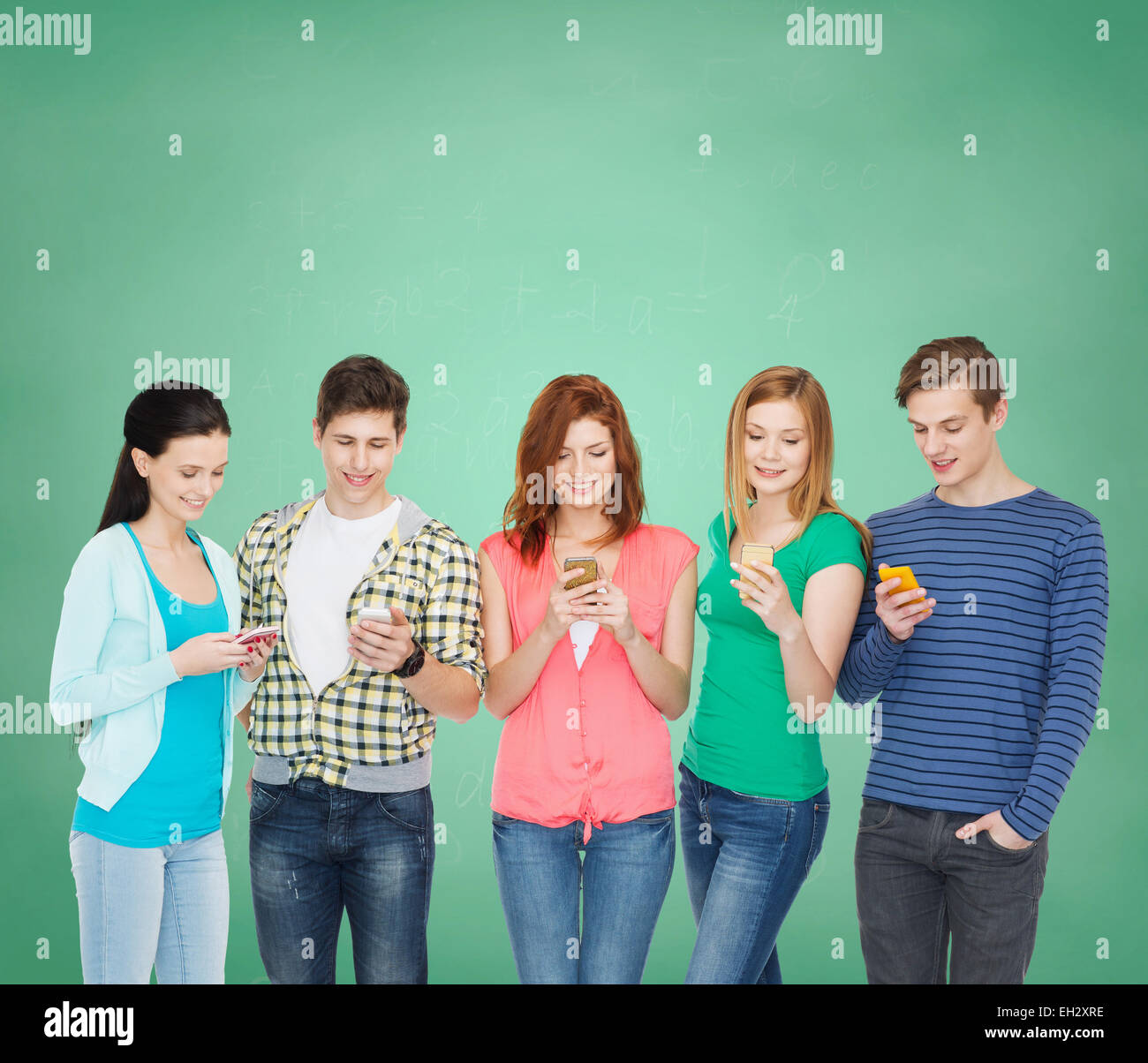 smiling students with smartphones Stock Photo - Alamy