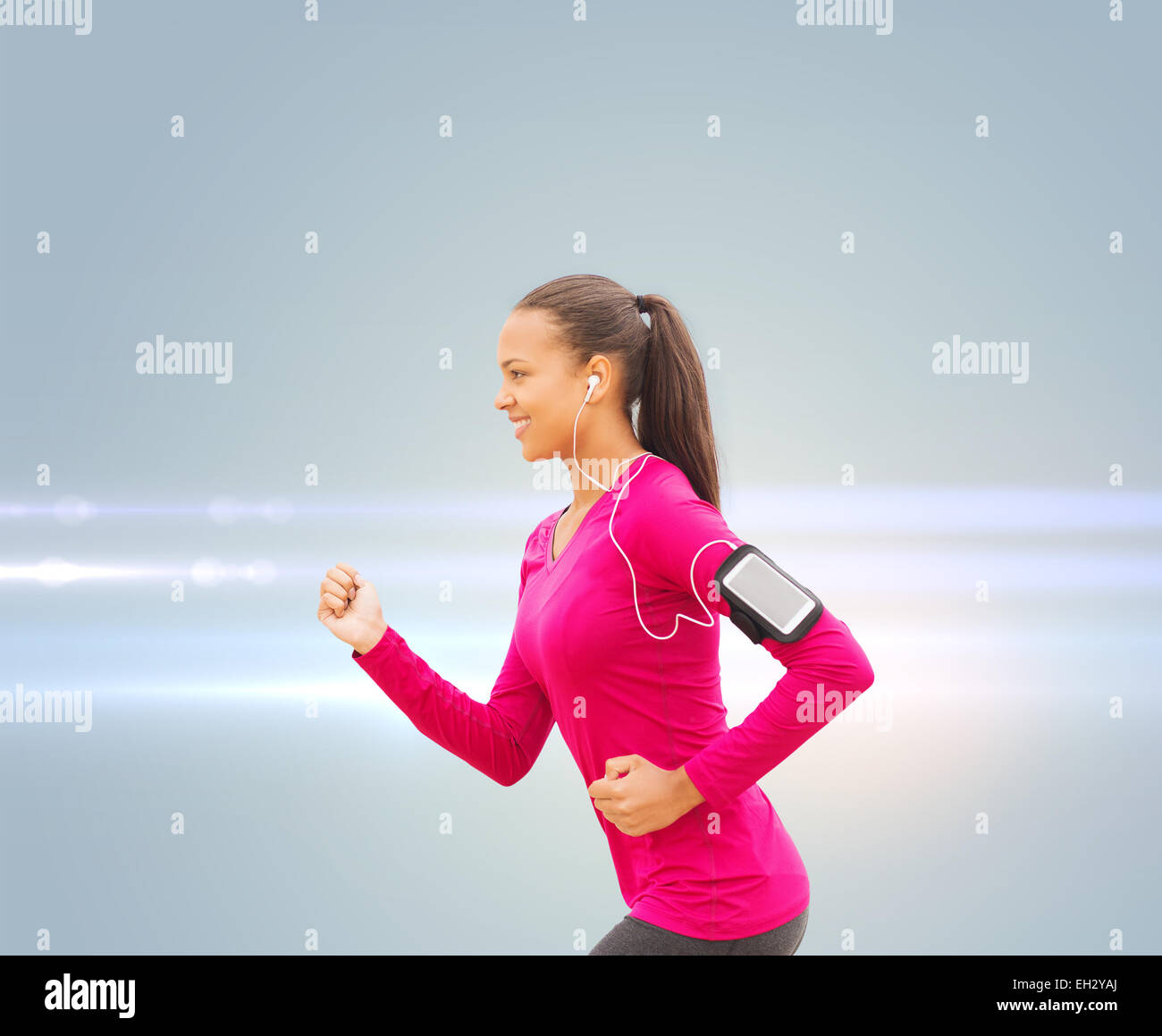 smiling young woman running Stock Photo - Alamy