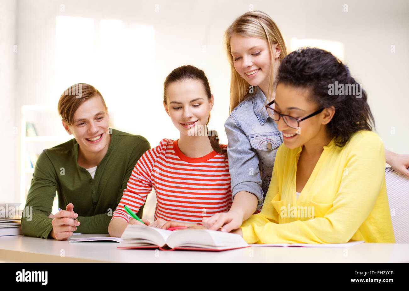 students with textbooks and books at school Stock Photo - Alamy