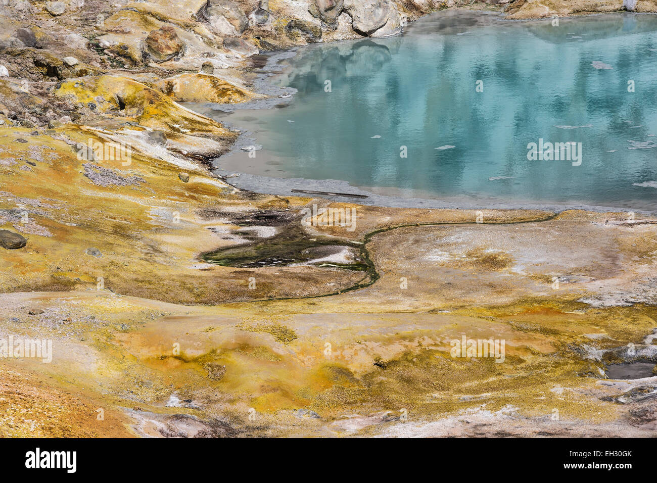 Volcanic activity creates colorful hydrothermal features, colored by ...