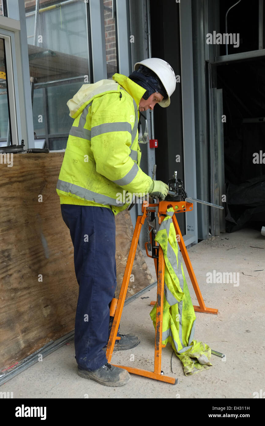 Construction contractors working on heating and electrical ...