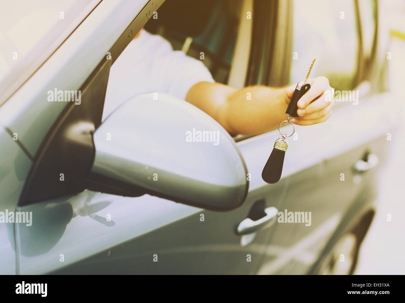 man with car key outside Stock Photo - Alamy