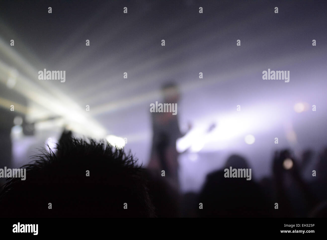 blurred stage shot from the audience with stage lighting Stock Photo ...