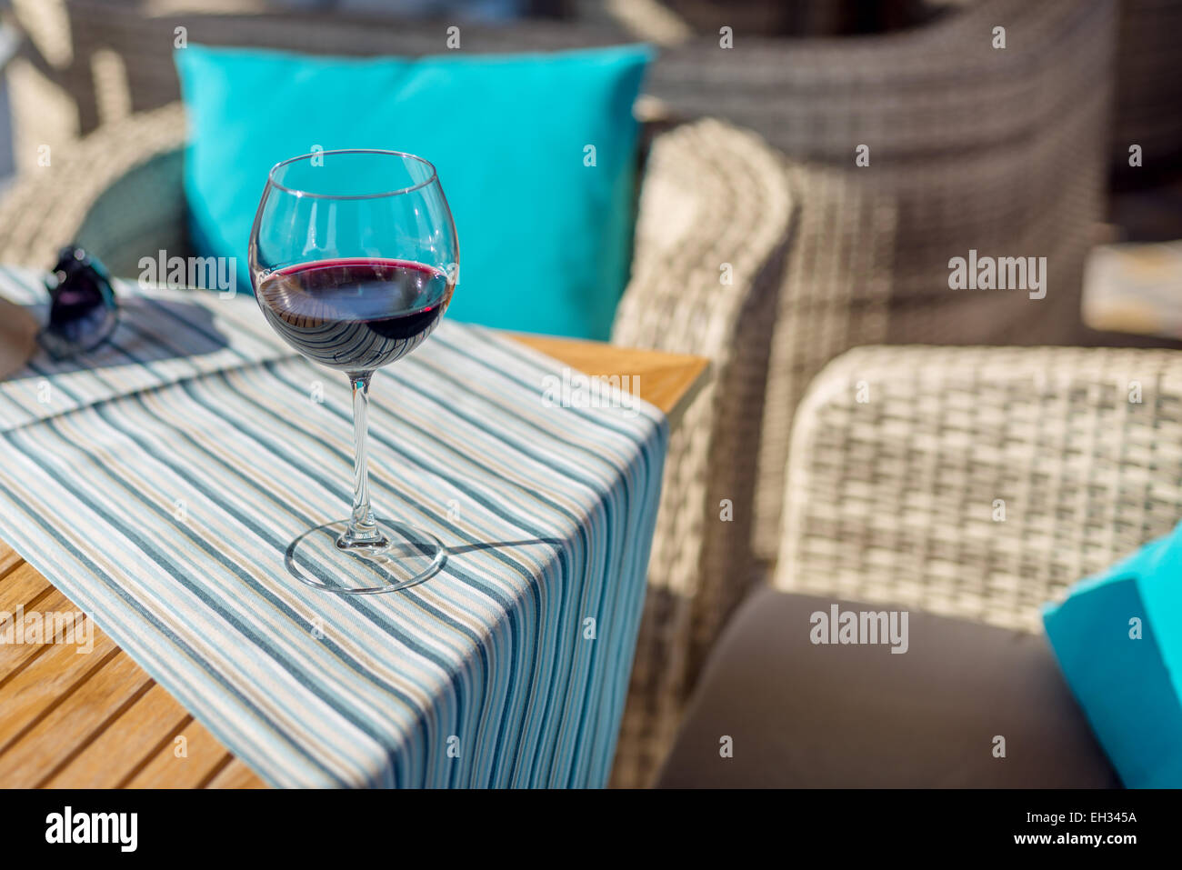 Glass of wine on the table Stock Photo - Alamy