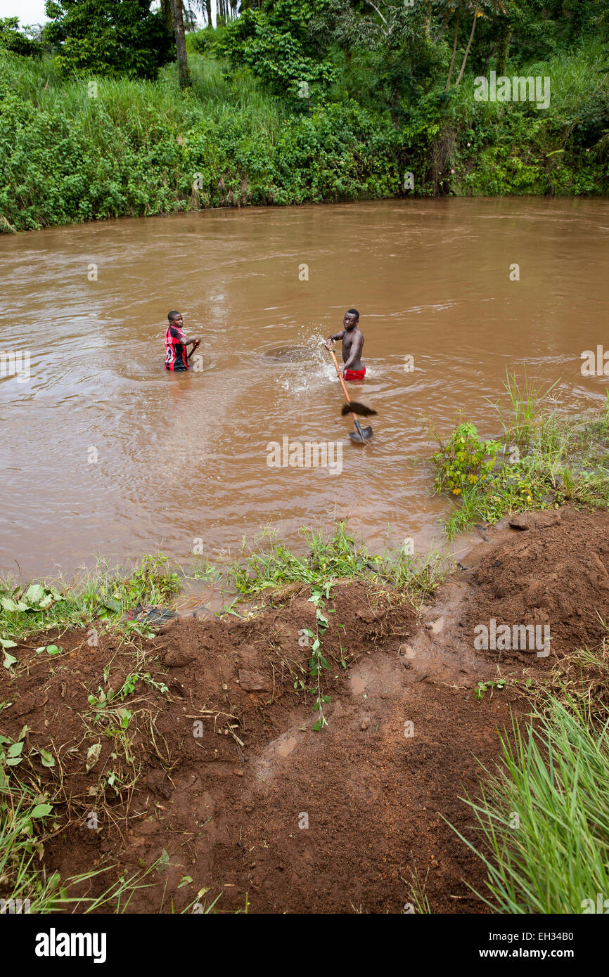 Sand collectors working in a fast-flowing river. This is an ideal ...