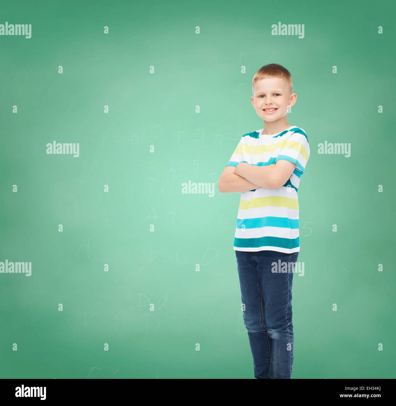 little boy in casual clothes with arms crossed Stock Photo - Alamy