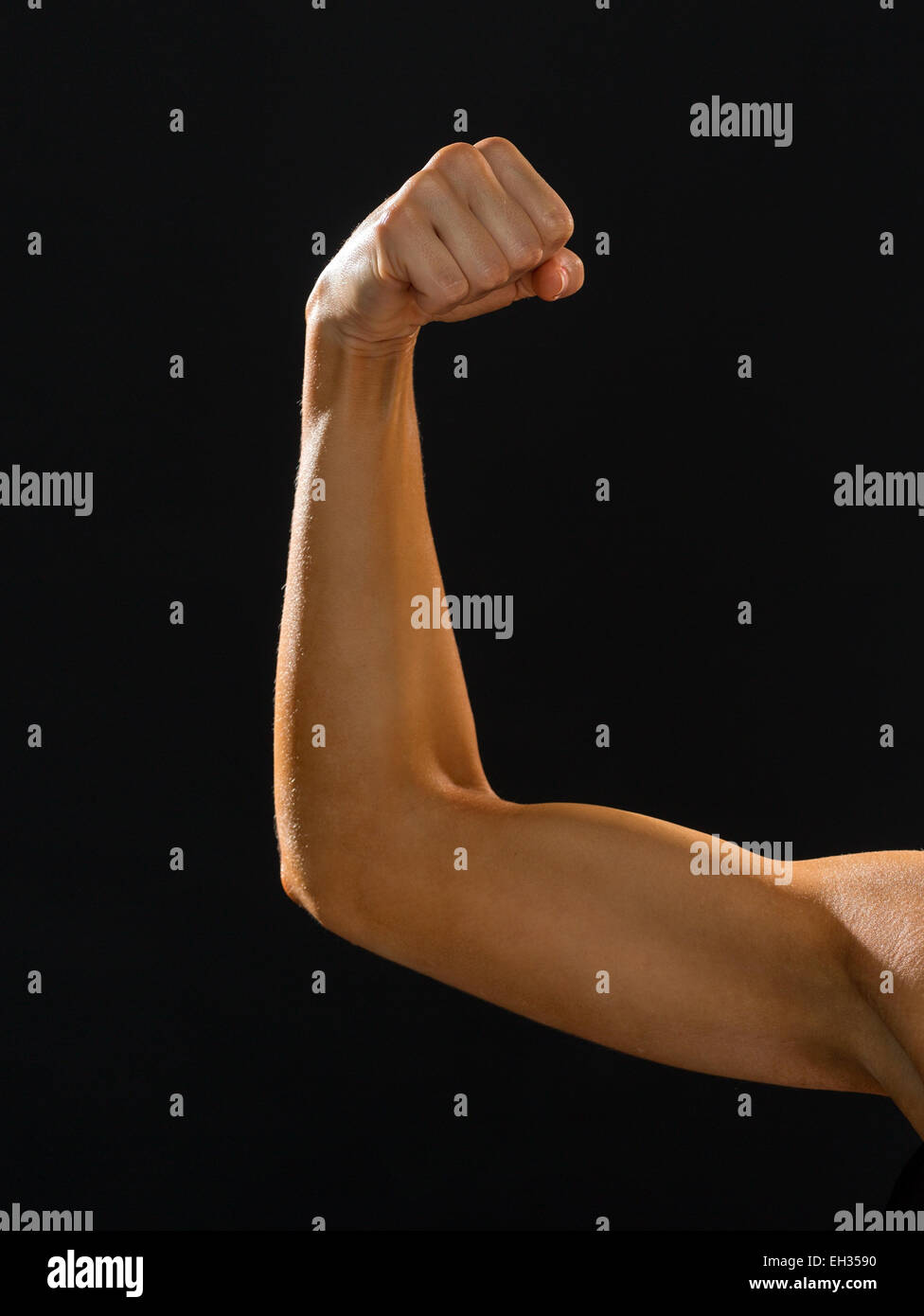 close up of athletic woman flexing her biceps Stock Photo - Alamy