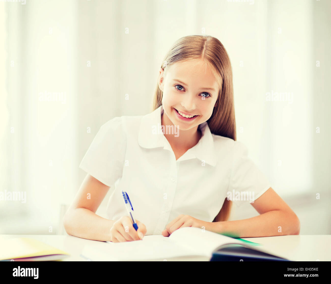 student girl studying at school Stock Photo - Alamy