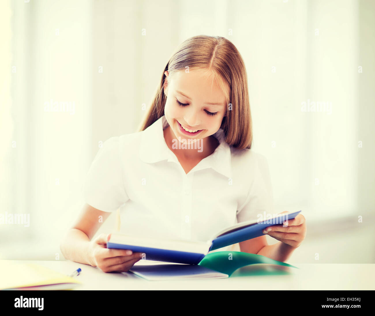 student girl studying at school Stock Photo - Alamy