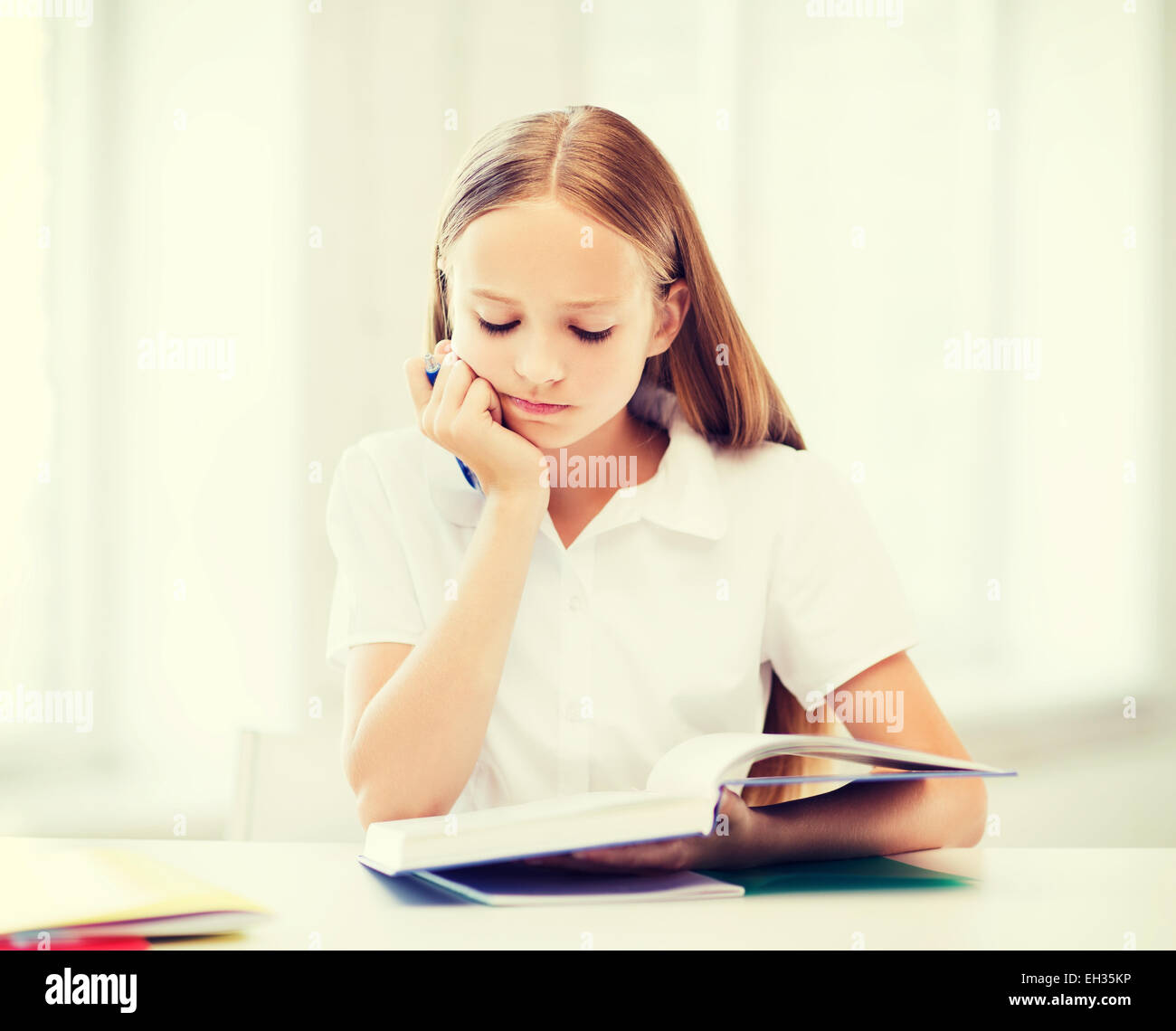 student girl studying at school Stock Photo - Alamy
