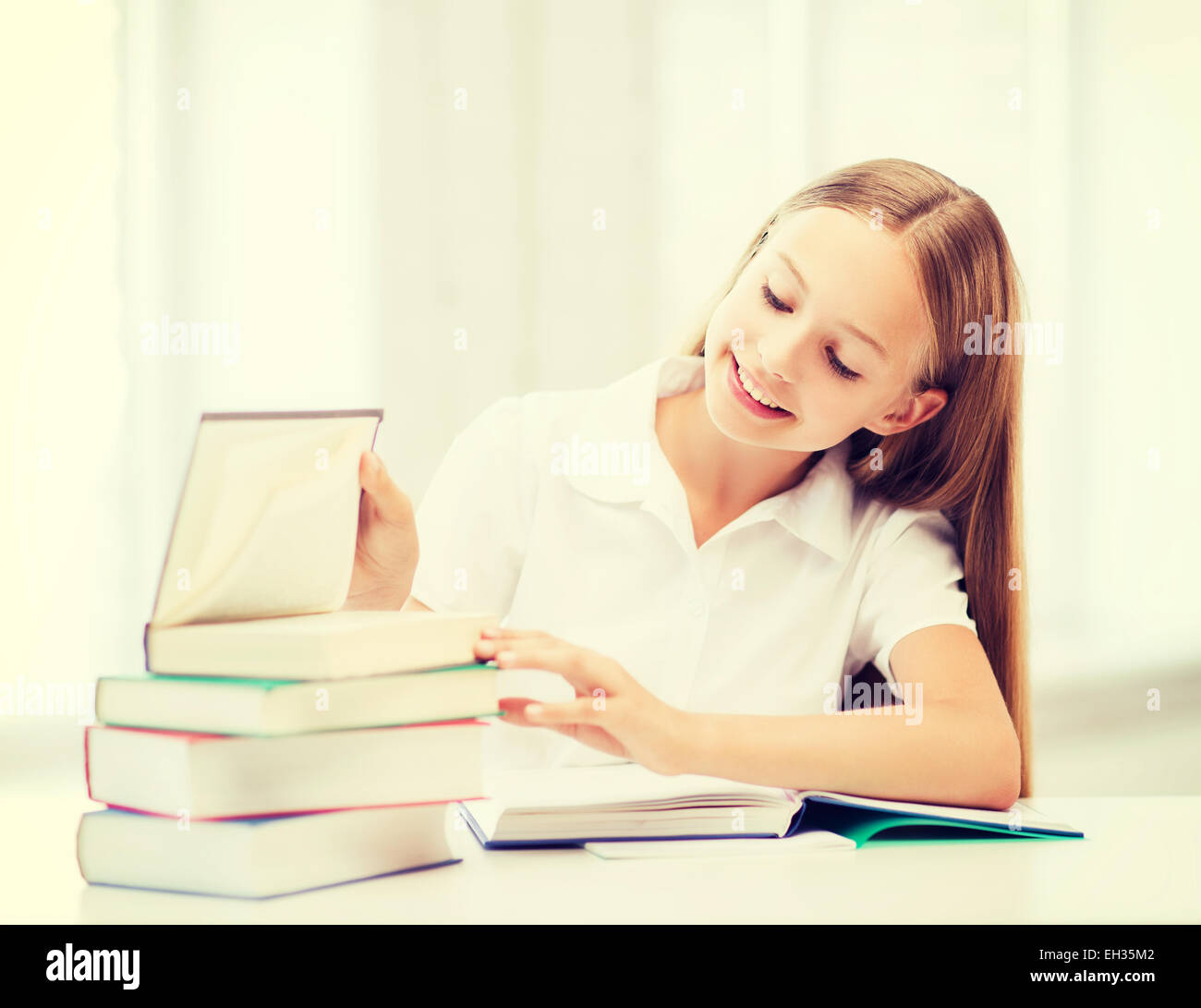 student girl studying at school Stock Photo - Alamy