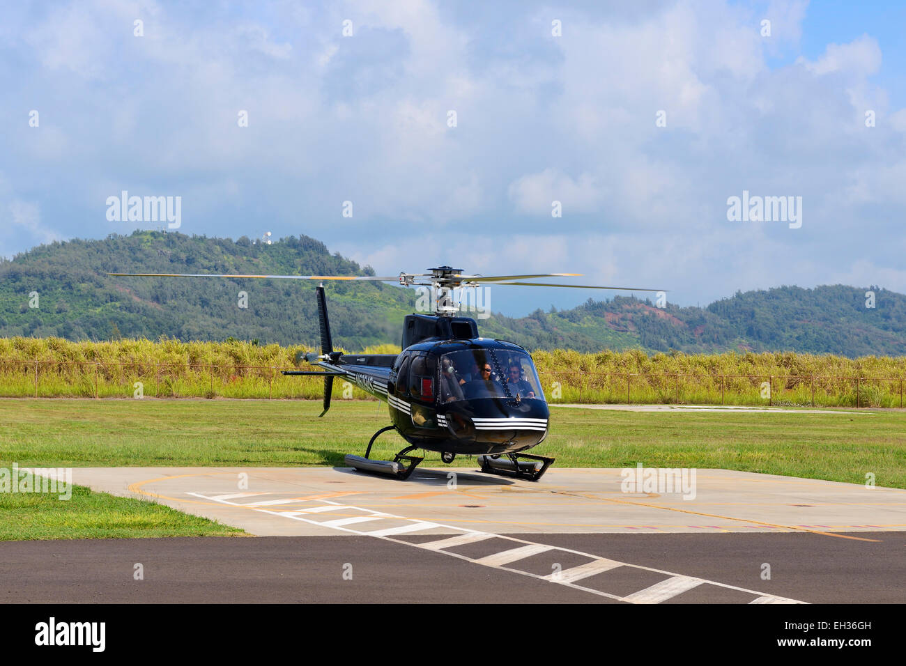 Aerospatiale AS350BA helicopter prepares for takeoff at Lihue ...