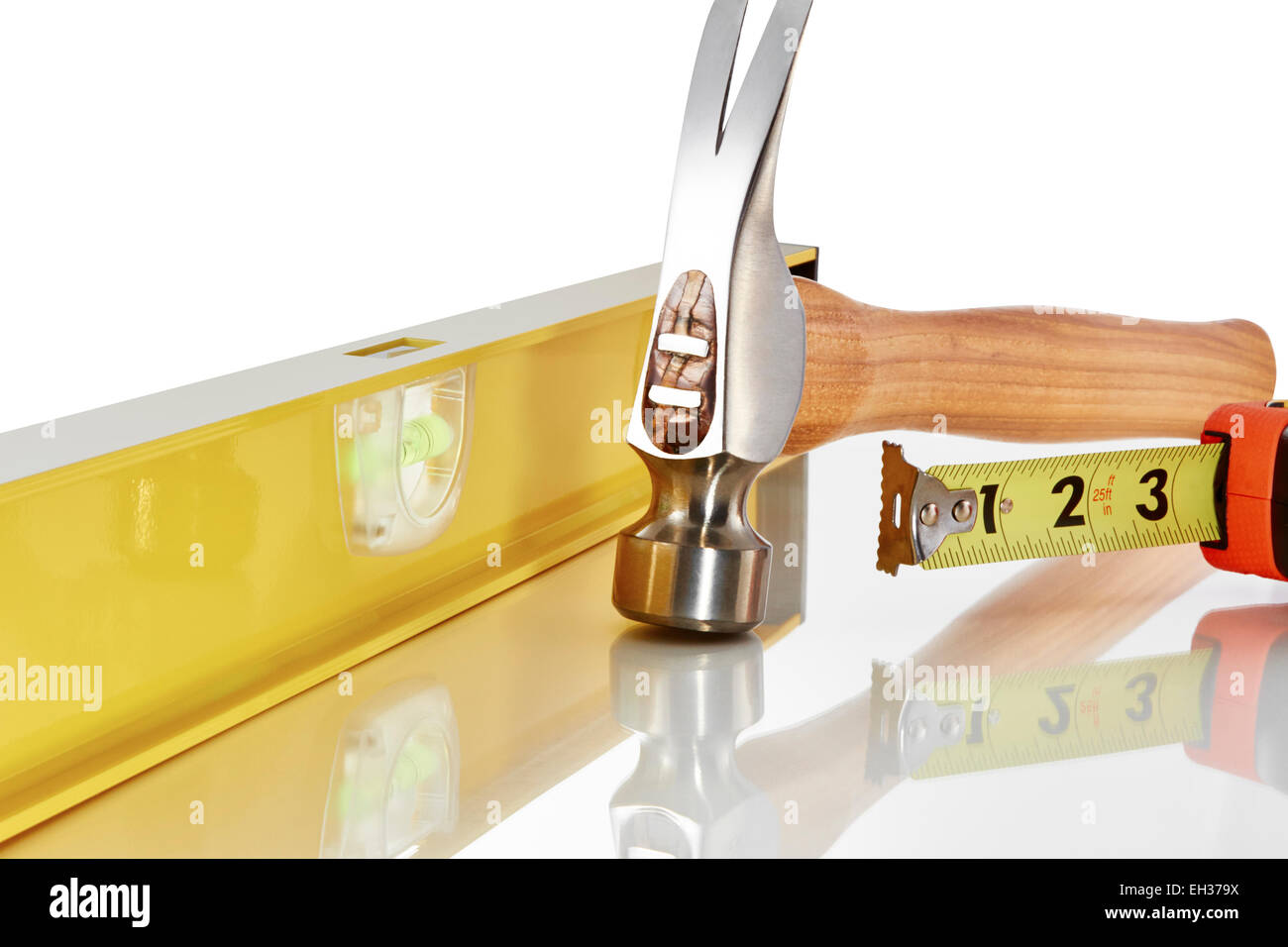 Detailed closeup of construction tools, level, measuring tape, and ...