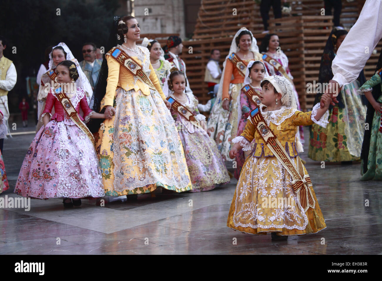 women and children dressed in traditional las fallas festival costumes ...