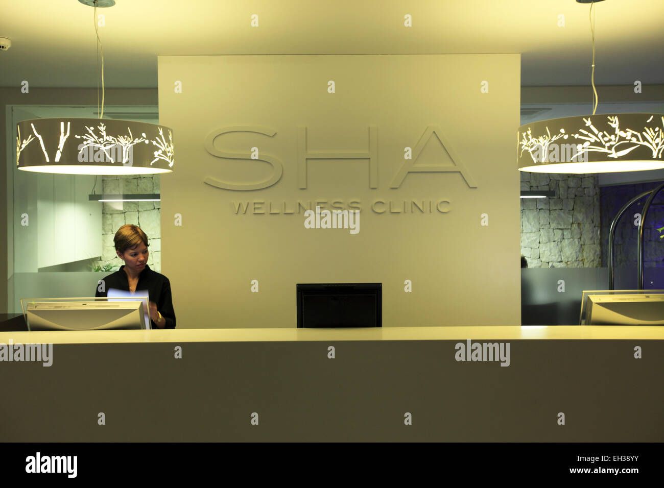 The receptionist in the reception of SHA wellness clinic, Alicante ...