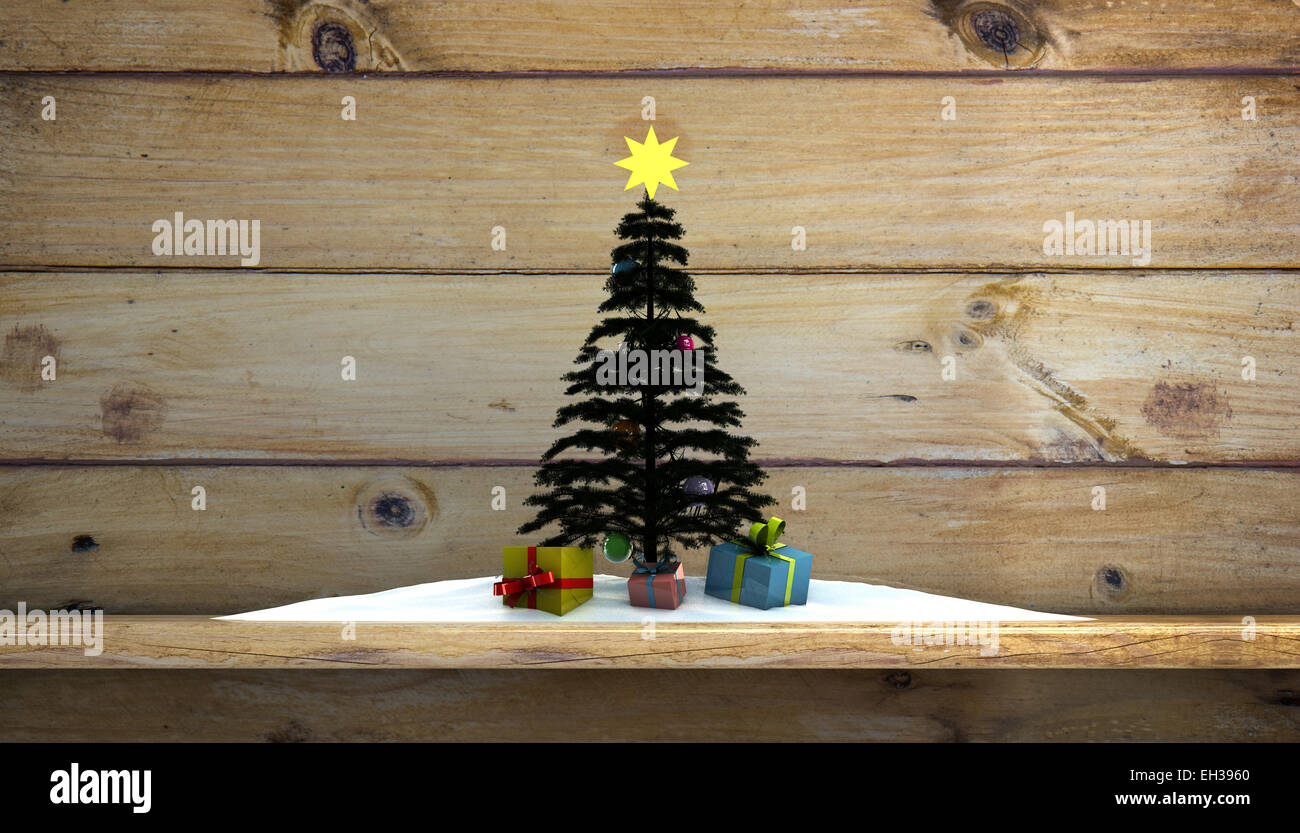 decorated Christmas tree with gifts and snow Stock Photo - Alamy